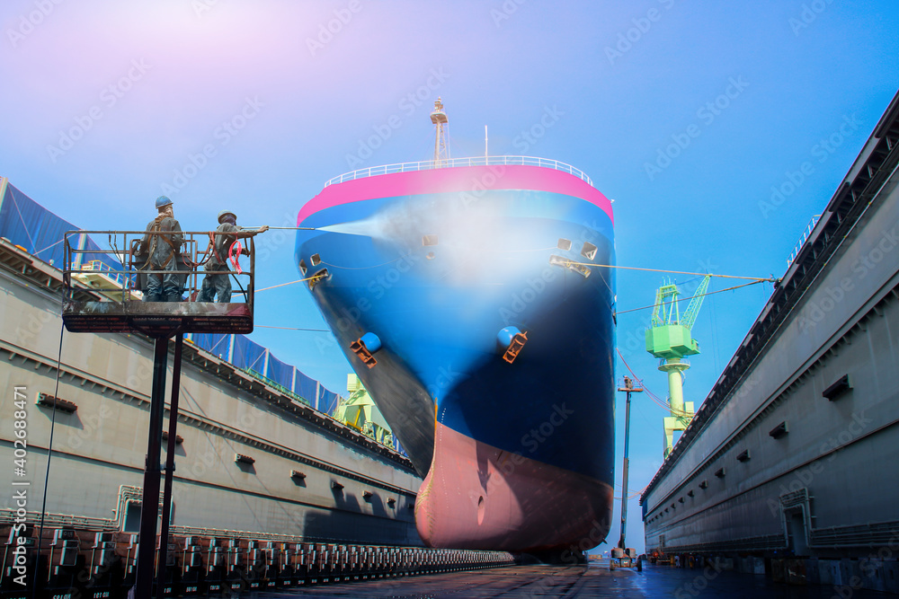 Manual Ship Wshin and Cleaning by water jet with front of Carrier ship ...