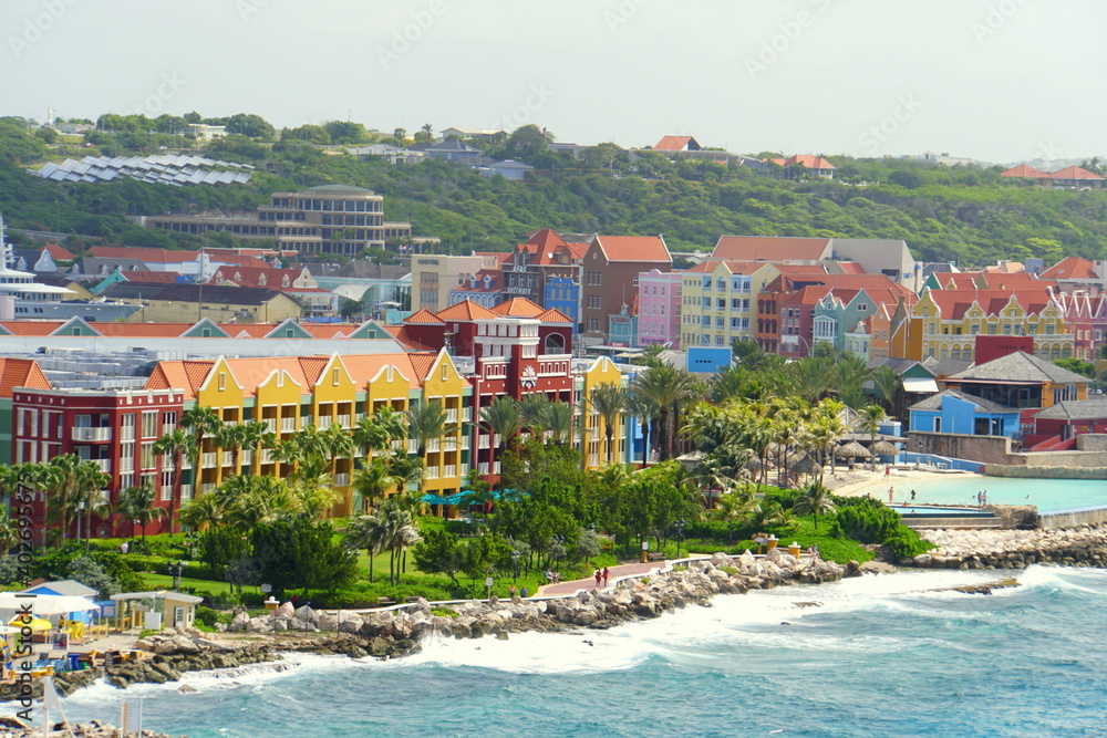 The aerial view of the buildings and resorts along St Anna Bay near ...