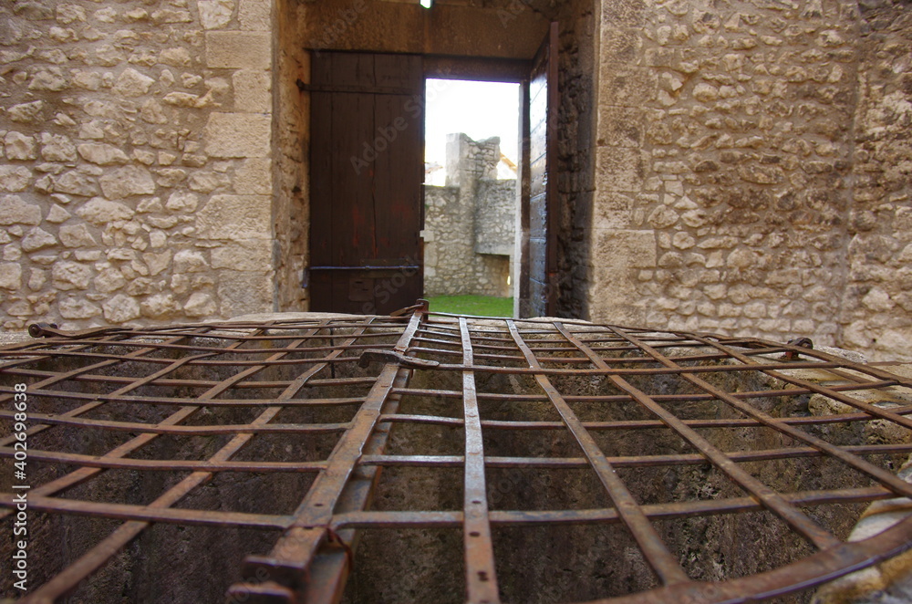 Detail of the grate of the ancient fifteenth-century well located in ...