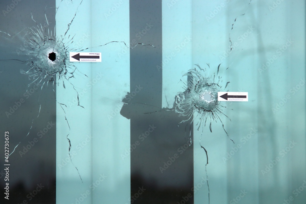 Bullet holes in windows, doors and wall after attac Stock Photo | Adobe ...