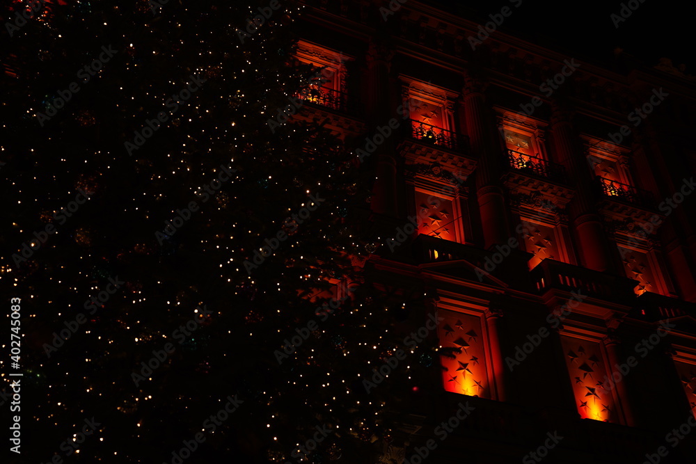 Dark night at Paradeplatz at Christmastime. Illuminated windows with ...