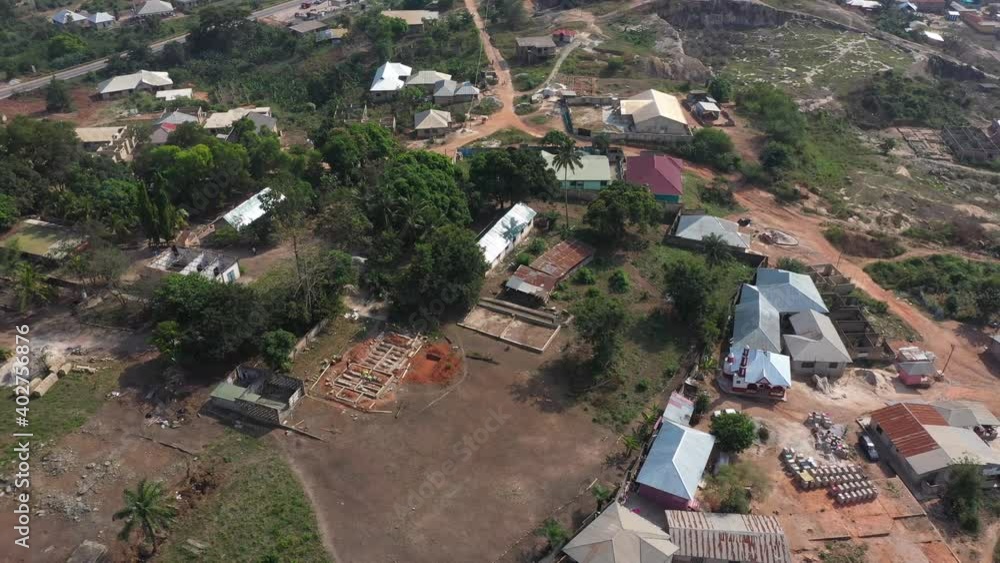 Aerial rural Kumasi houses walled compound. Roads, streets poorly ...