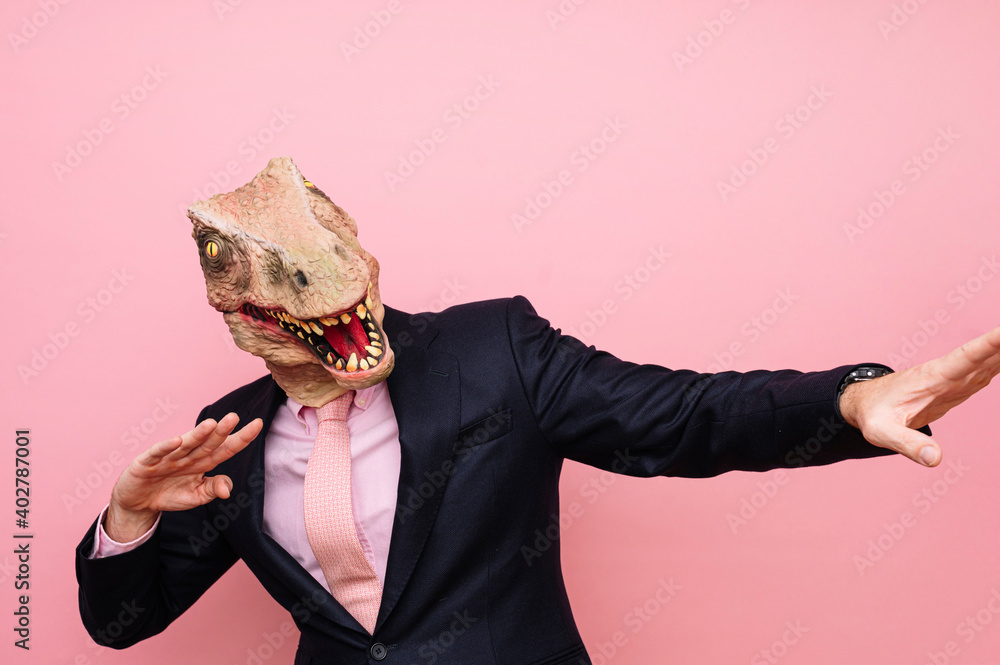 Euphoric lizard-headed man with raised arms Stock Photo | Adobe Stock