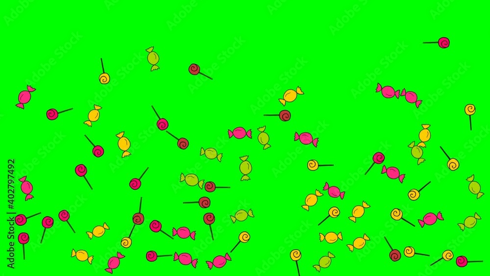 Sweets, candies and lollipops flying on green screen chroma key ...
