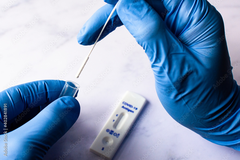 Corona Schnelltest mit Testlösung Stock Photo | Adobe Stock