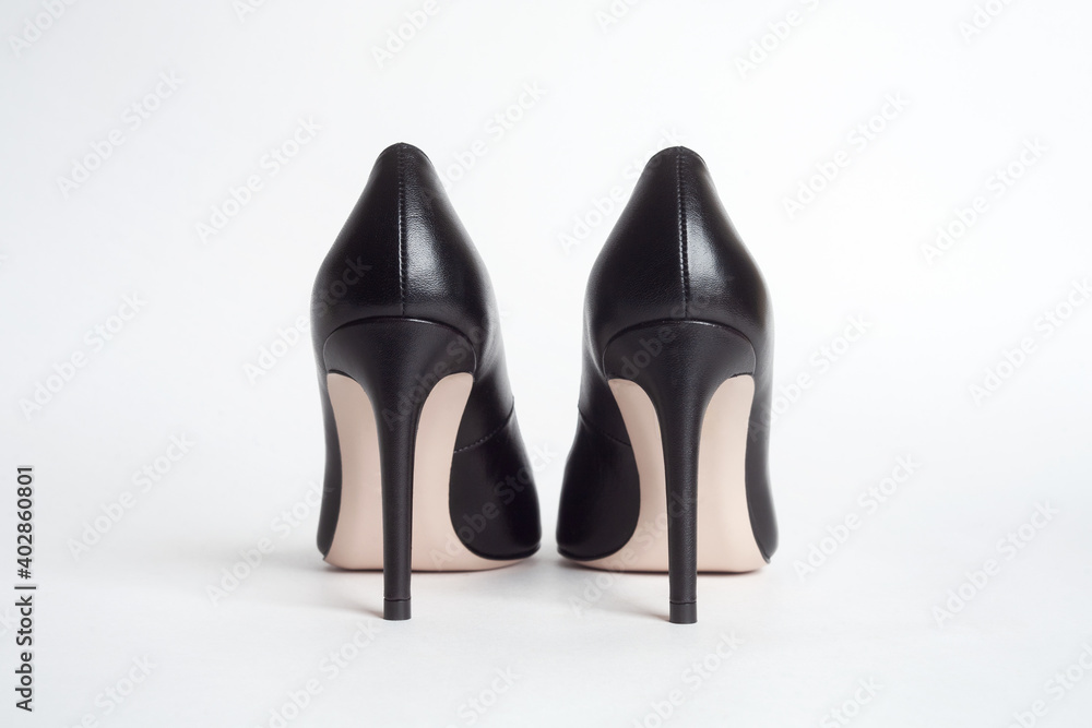 High heels back view. Black high heels on white background Stock Photo ...