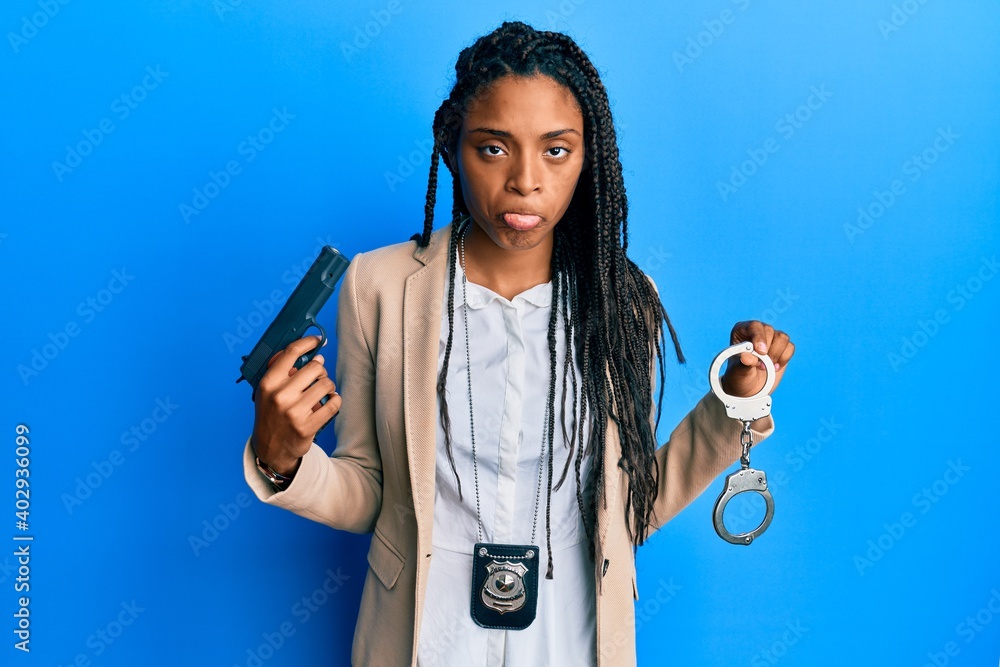 Fotografia Do Stock African American Police Woman Holding Gun And