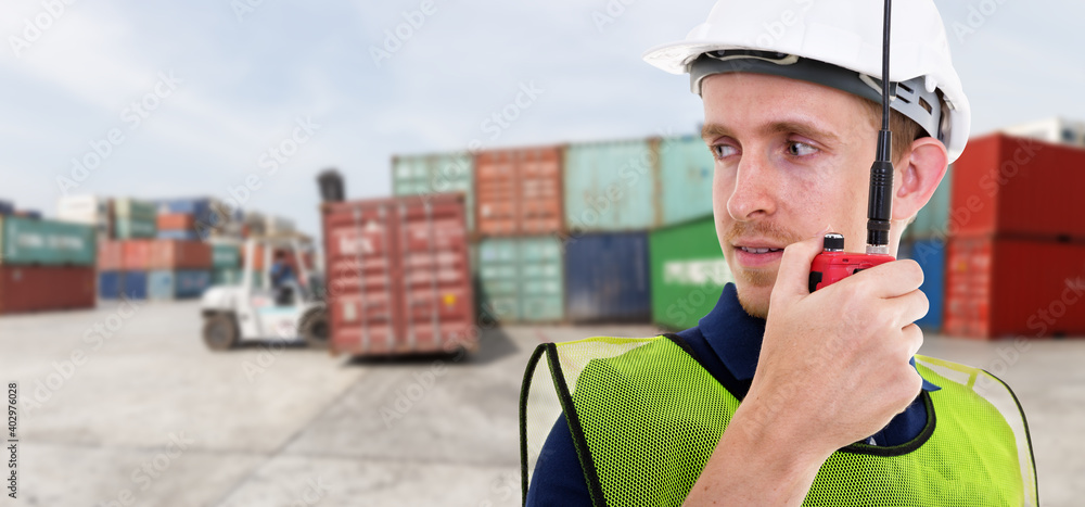 Transport Container Supervisor Managing Control Via Walkie Talkie in ...