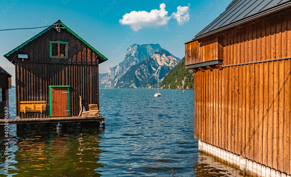 Beautiful alpine summer view with boat huts and the Traunstein mountain ...