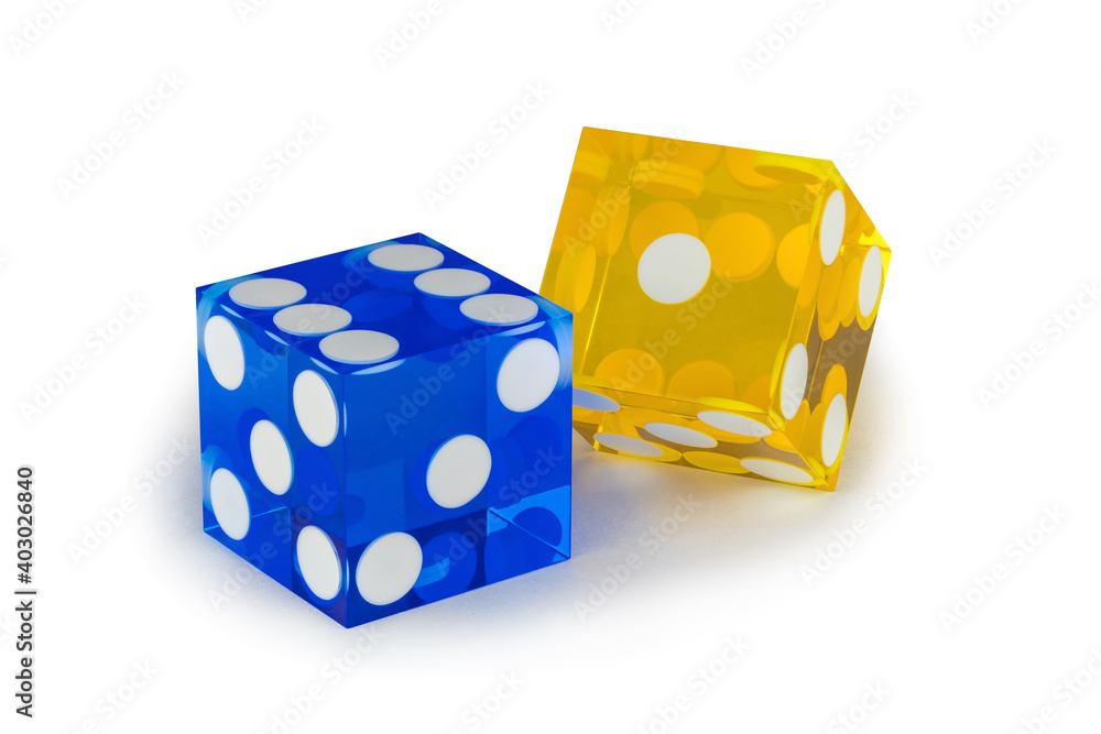 Two glass dice, blue and yellow, isolated on white, with a light shadow ...