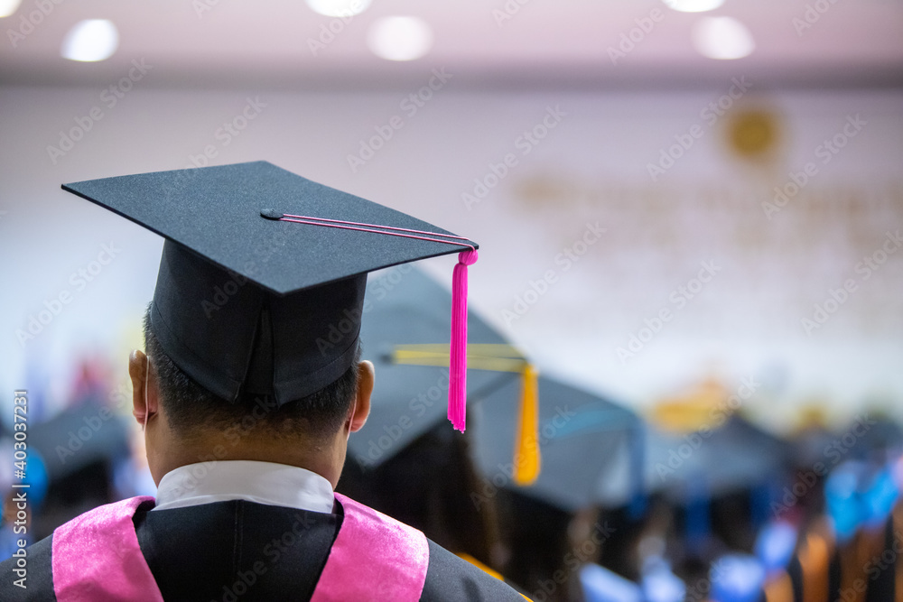 Graduation cap image from the back of graduates Graduates attending the ...