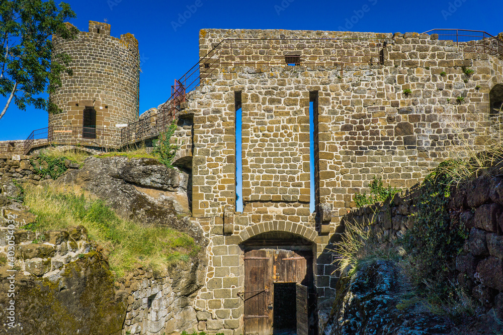 The fortified gate leads to the main court of the Fortress of Polignac ...