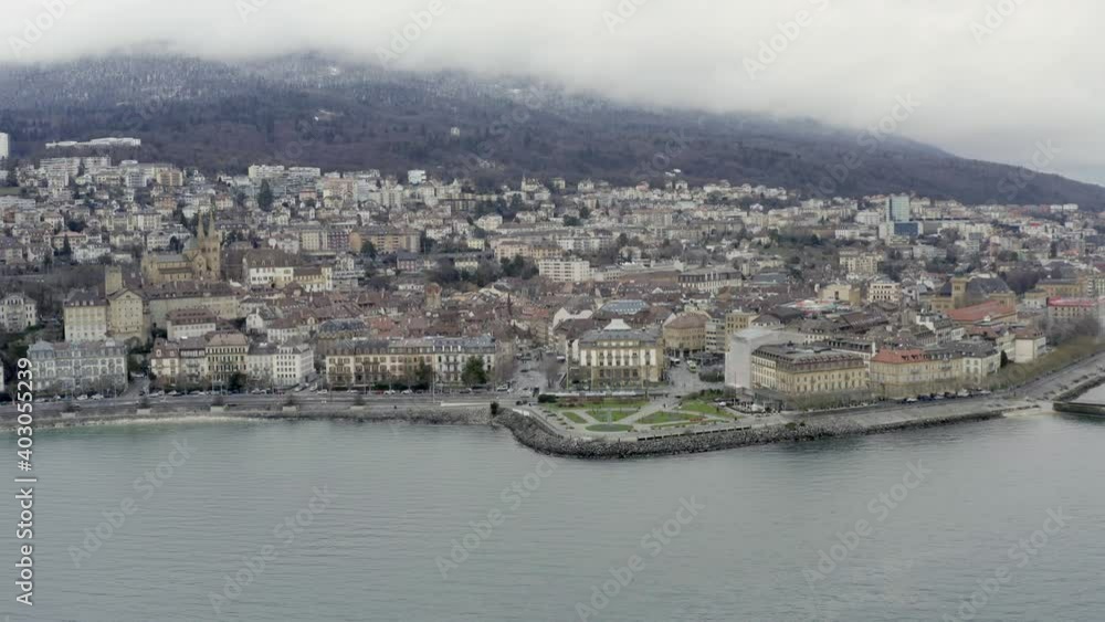 The romantic village Neuchâtel located on the beautiful lake during the ...