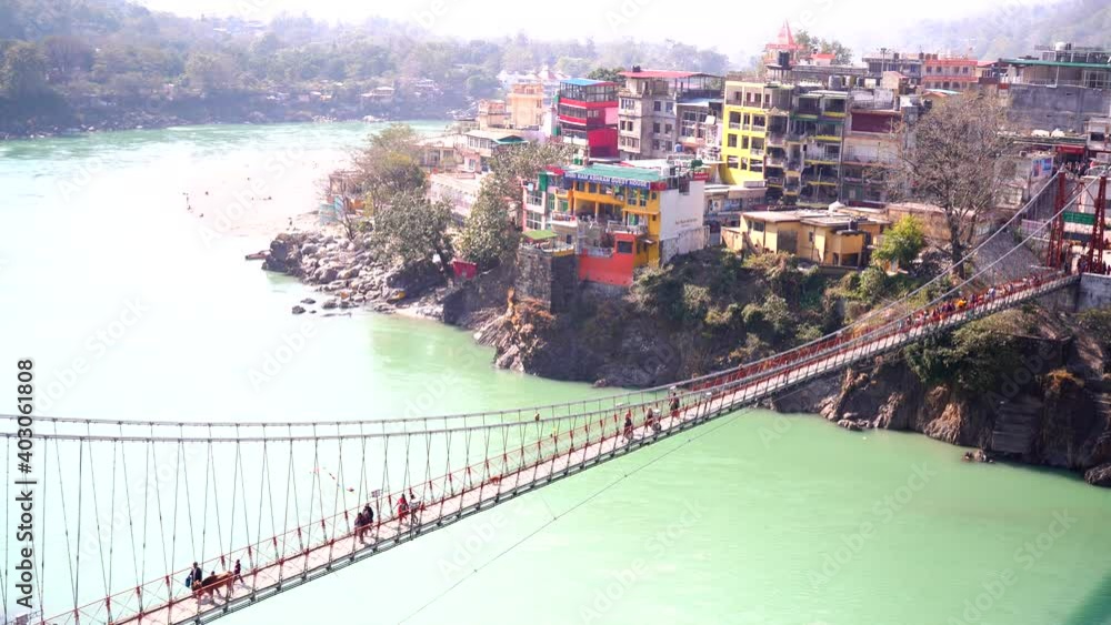 Ram Jhula This long famous pedestrian suspension bridge crossing the ...