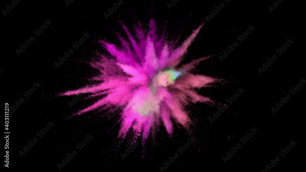 Super slow motion of colored powder explosion isolated on black ...