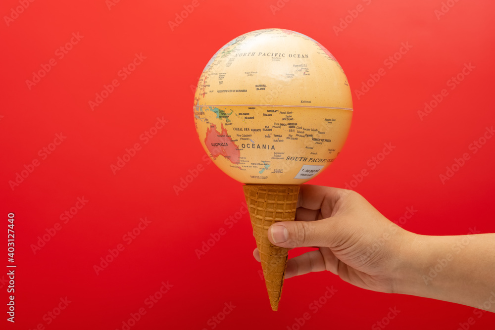 ice cream cone made of a globe concept of overusing the resource of ...
