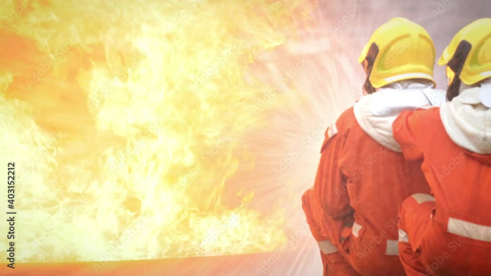 Video „Firefighter teamwork in fire protection suit on safety rescue ...