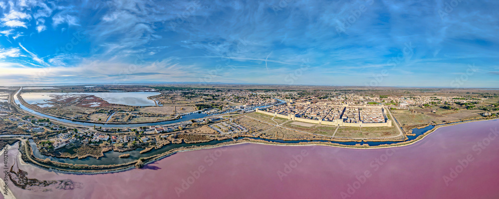 Aerial view of pink salt lagoon and areas surrounding Aigues mortes ...