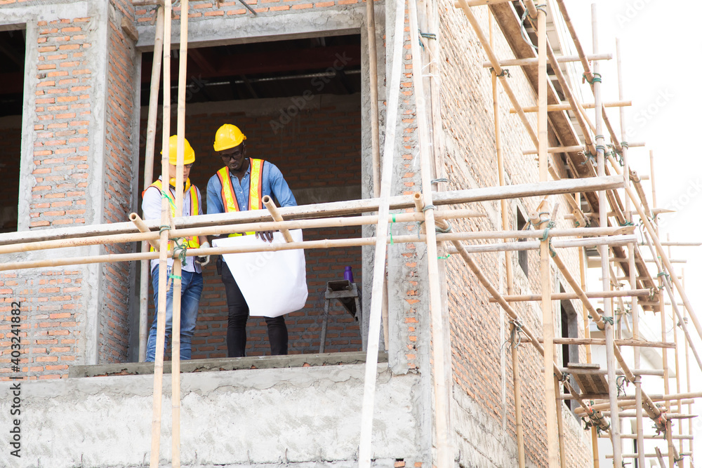 Professional Construction and Engineer team Working on workplace ...