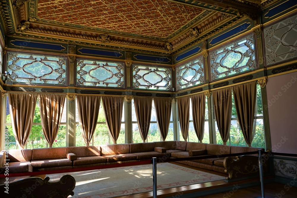 Turkish sofas and colorful ceiling in traditional Ottoman room of the ...