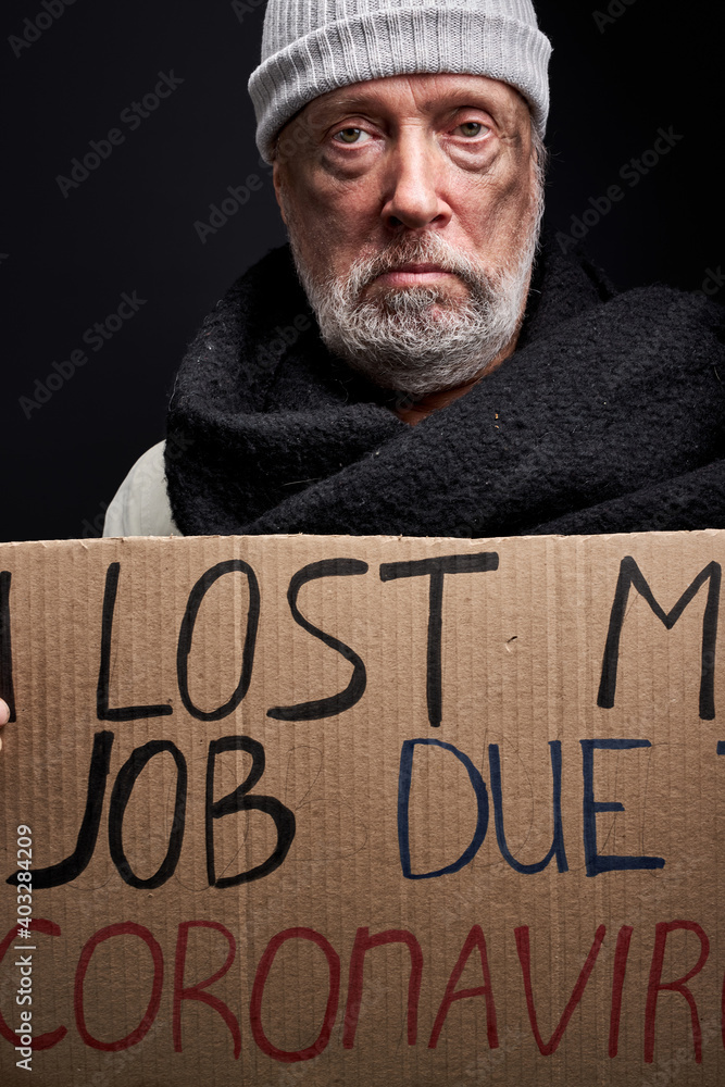 homeless man lost his job due to coronavirus COVID-19, he stands with ...