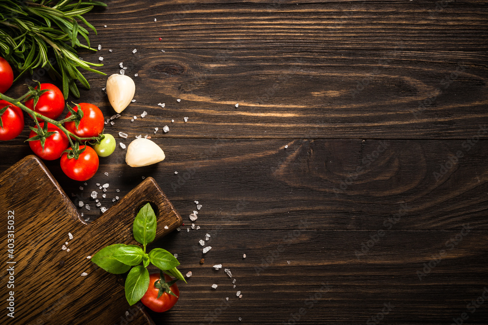 Food cooking background with spices, herbs and vegetables at wooden ...