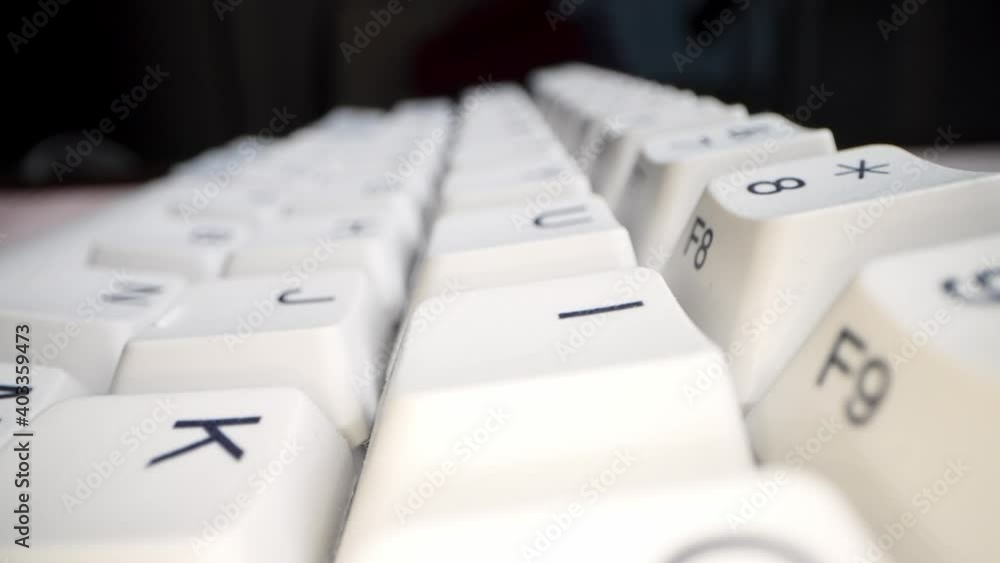 White keyboard keys. Camera movement from left to right. Macro ...