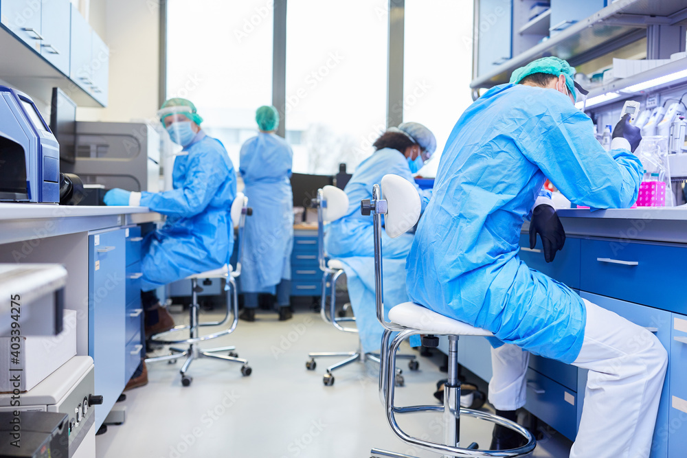 Group researcher works on Covid-19 vaccine in the laboratory Stock ...