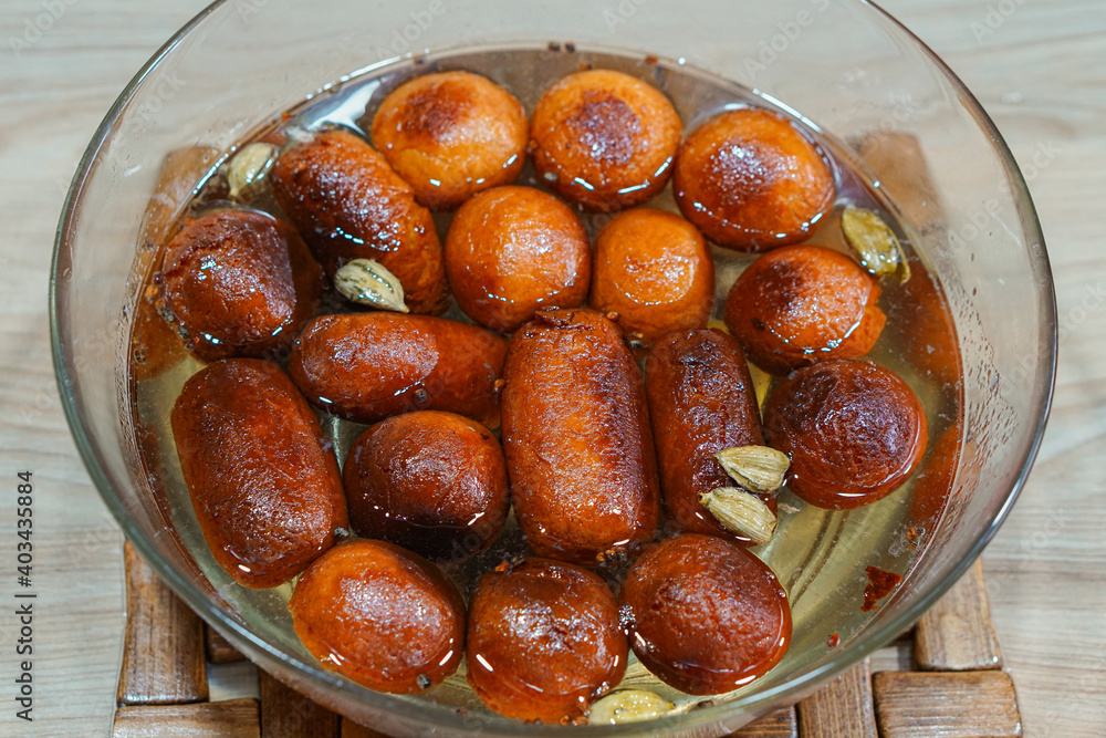 Famous delicious sweet of pakistan and india brown gulab jamun Stock ...