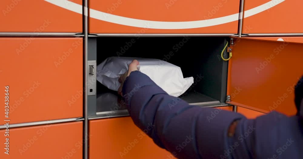 send parcel with self service post terminal machine. hand open locker ...