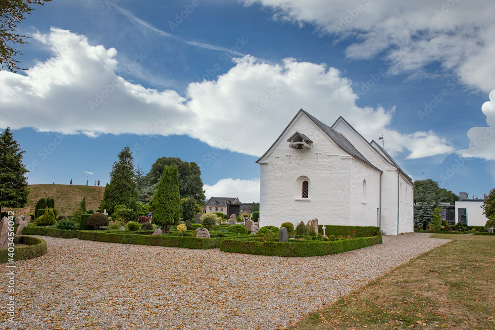 Jelling Church is a church in Jelling on Jutland in Denmark. It is ...
