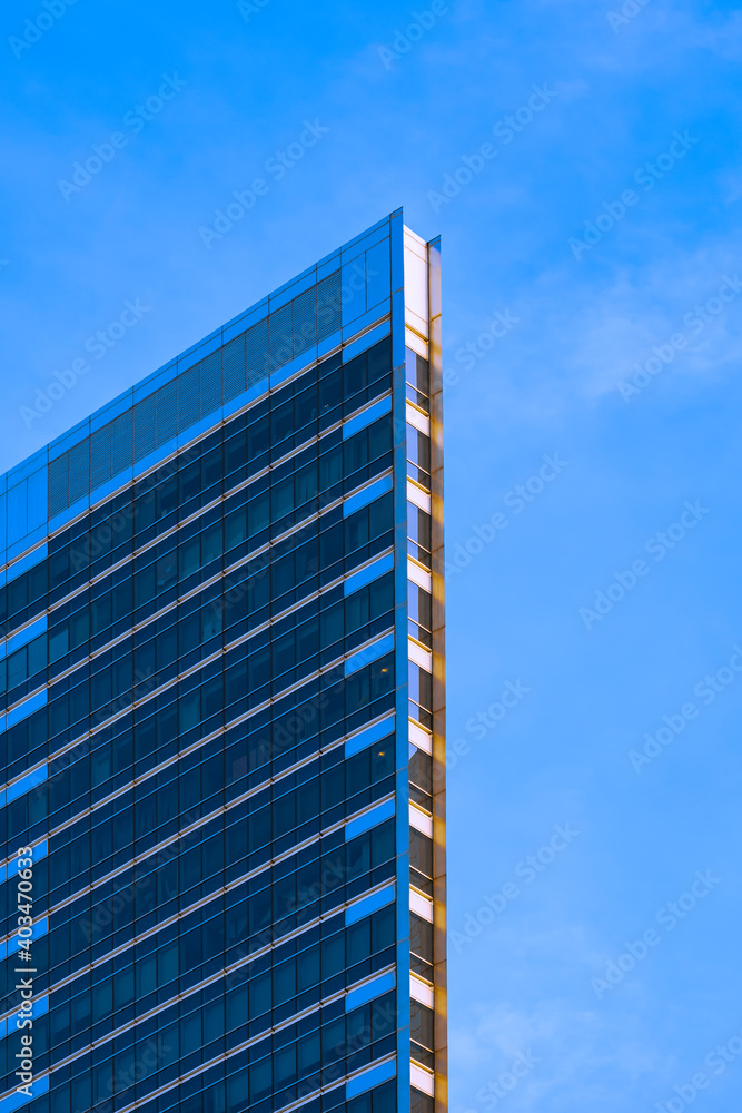 Low angle and perspective side view of modern high office building in ...