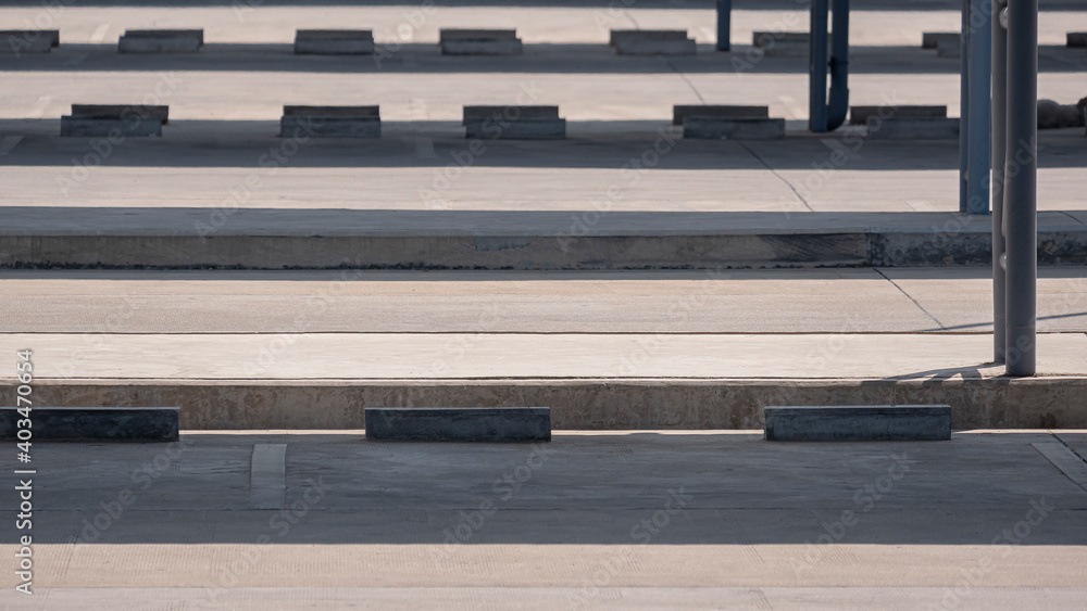 Row of walkways with empty parking lanes in outdoor car parking area of ...
