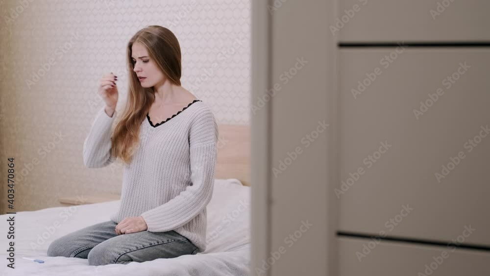 Desperate Sad Unhappy Black Woman Looks At Pregnancy Test Being