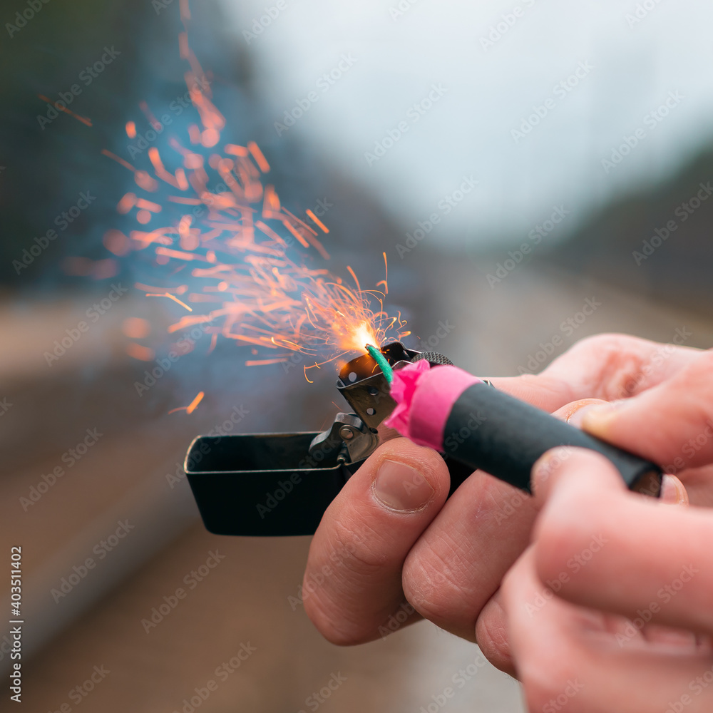 The Firecracker in a Hand. Man Holding a Burning Petard in His Hand. A ...