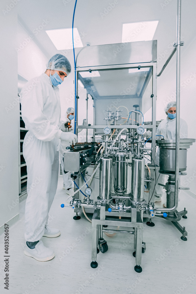 Bottling and packaging of sterile medical products. Machine after ...