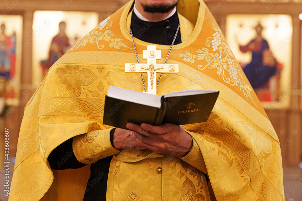 Orthodox Church. Christianity. Priest hands holding Holy Bible book in ...