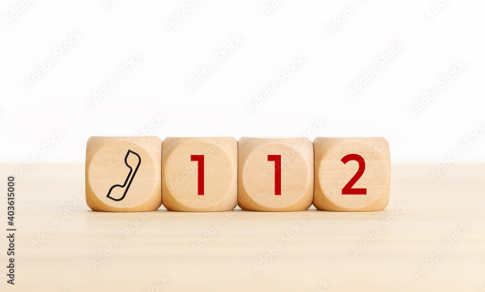112 emergency concept. Wooden dices with phone icon and 112 text Stock ...