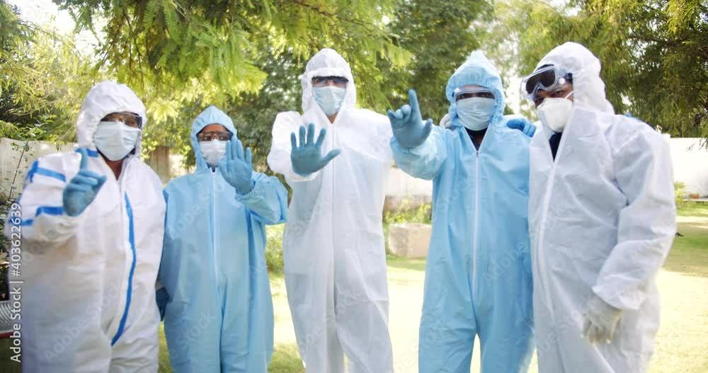 Handheld slow-motion of young medical staff, females males, in full ...