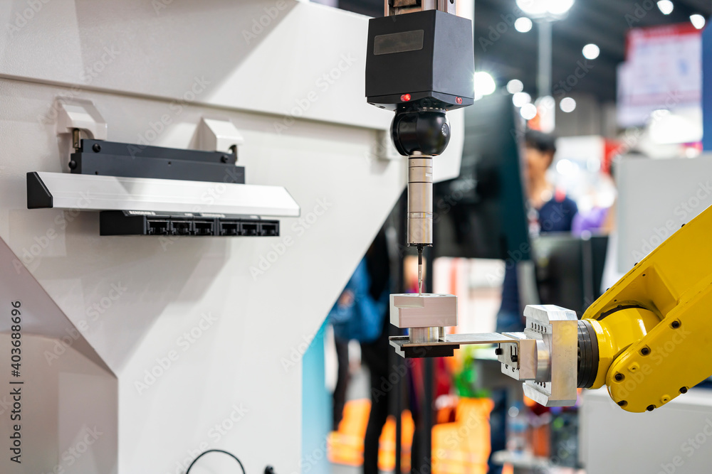 automatic coordinate measurement machine (CMM) during inspection ...