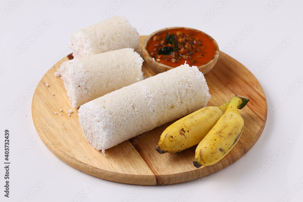 White rice puttu with chana curry Stock Photo | Adobe Stock