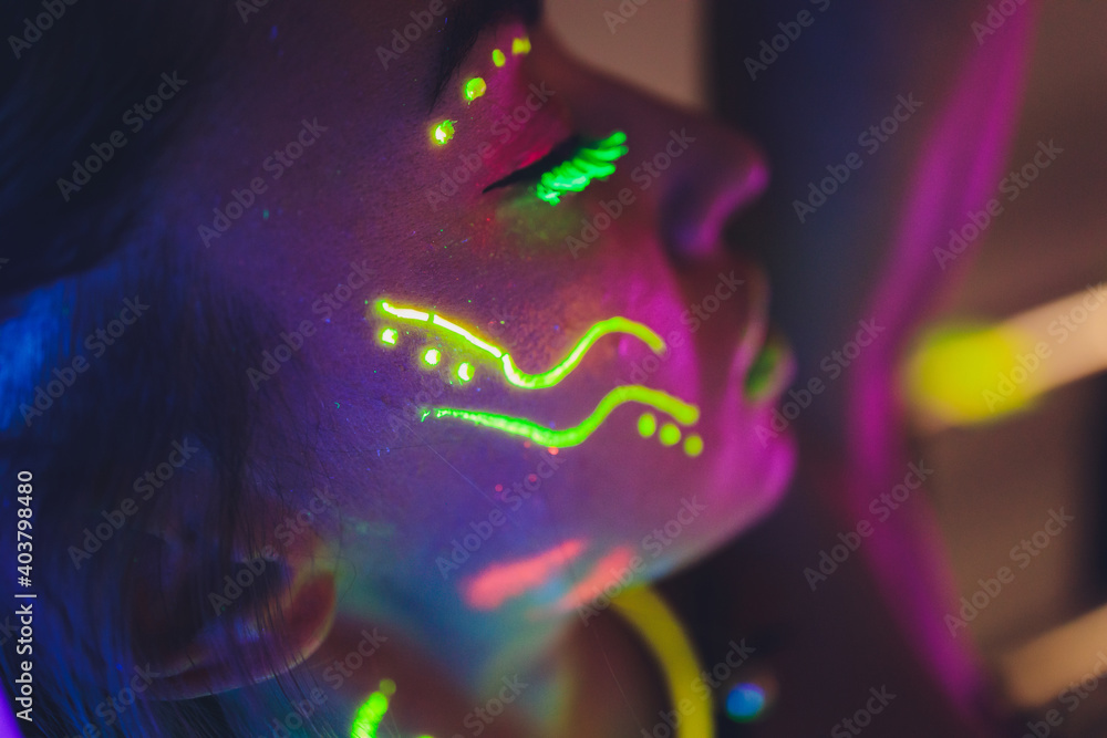 beautiful girl with lsd on tongue in nightclub with pink smoke. Stock ...
