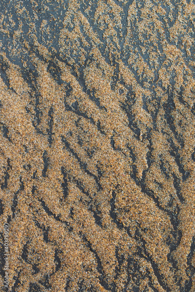 Extreme macro close up of fine beach sand surface pattern in the summer ...