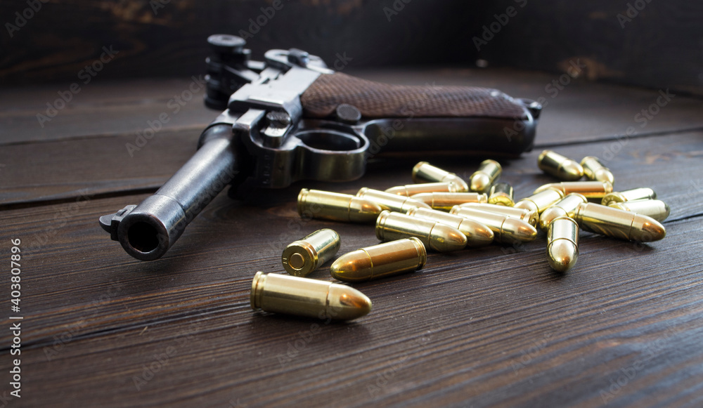 Historic Luger P08 Parabellum handgun, old soviet TT handgun and shiny ...