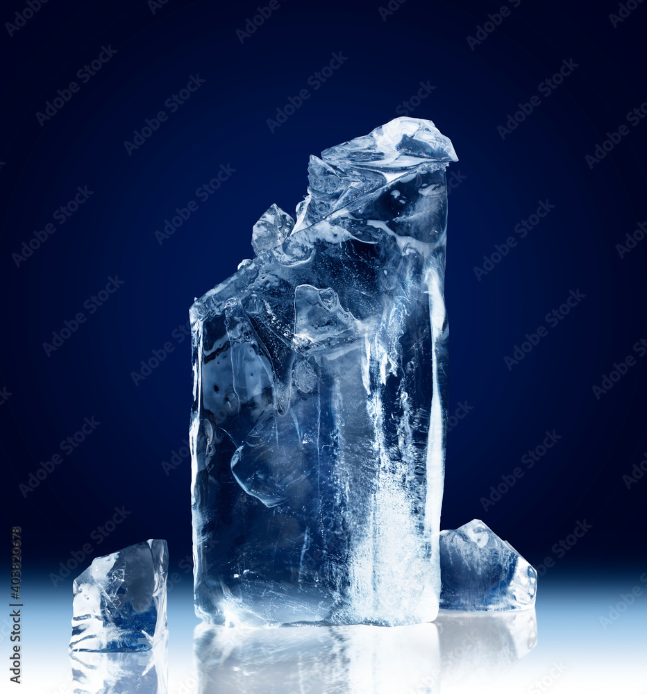 Vertical rectangular block of ice with a broken-off top isolated on a ...