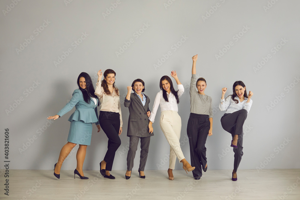 Team of excited young businesswomen celebrating their success. Group ...