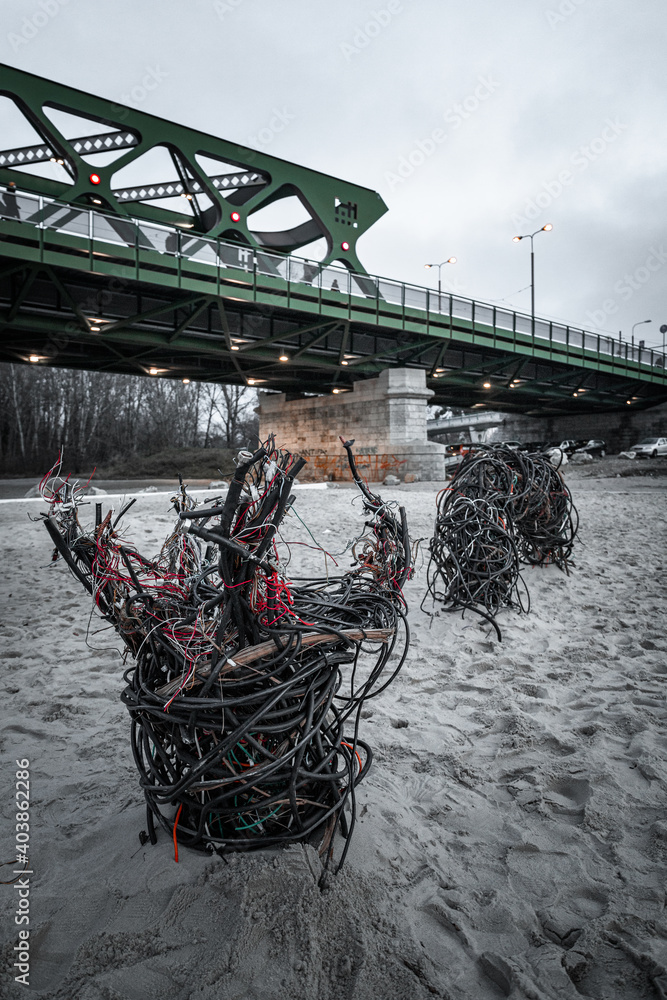 Worm made from cables as an art placed in sand in Bratislava Stock ...