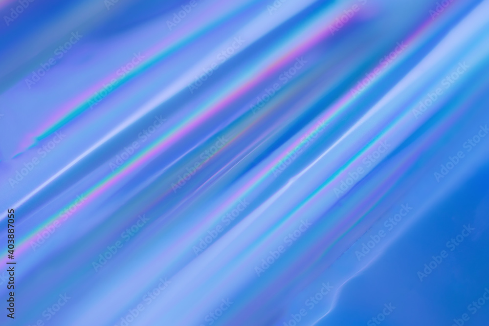 cool abstract blue holographic background of diagonal stripes in places ...