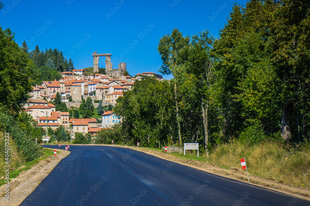 The medieval village of Allegre in Auvergne, France. On the top of the ...