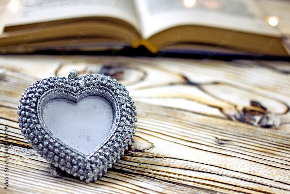 Heart photo frame background. A decorative silvery heart with a place ...